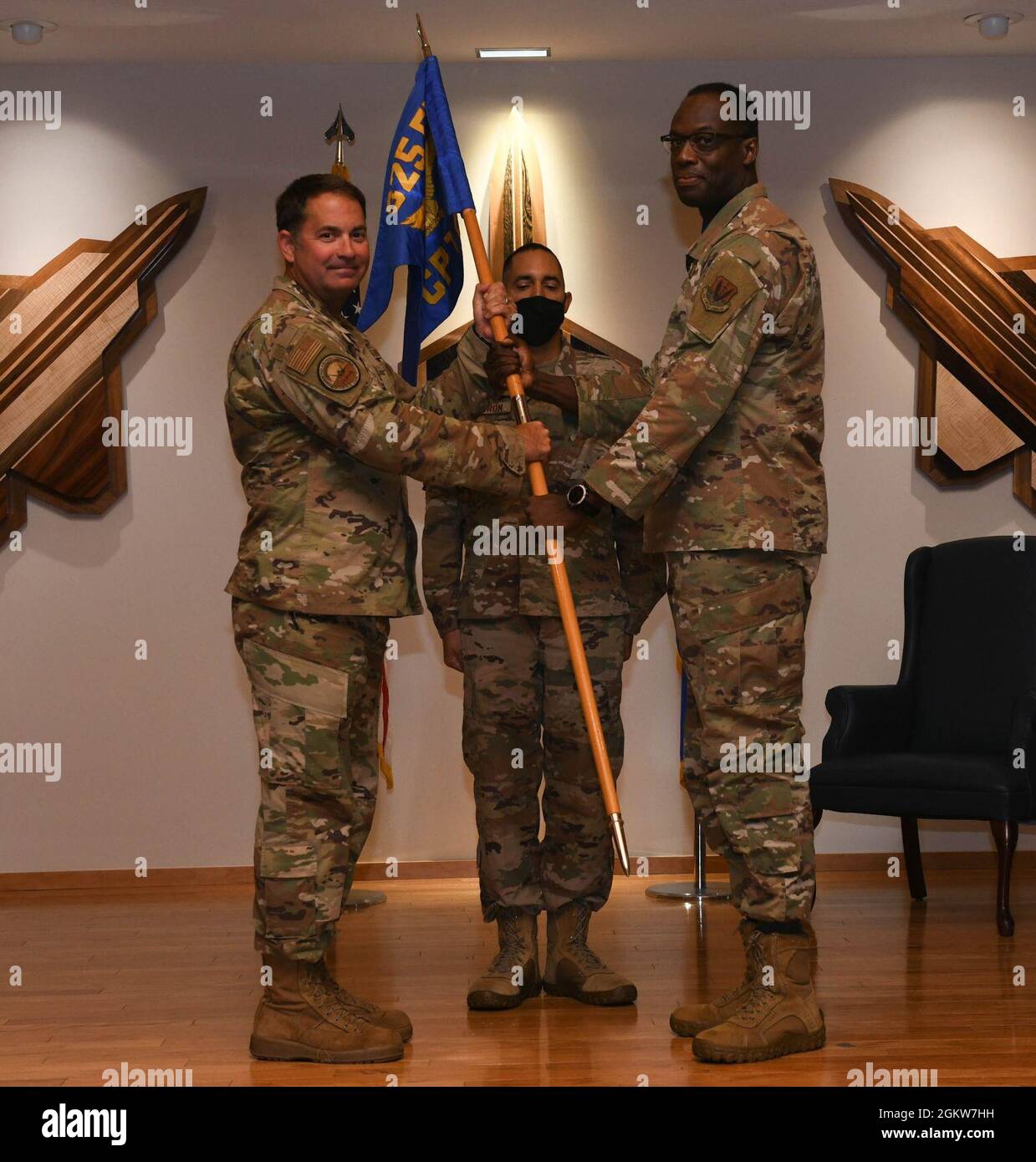 Col. Greg Moseley, 325th Fighter Wing commander (left), passes the ...