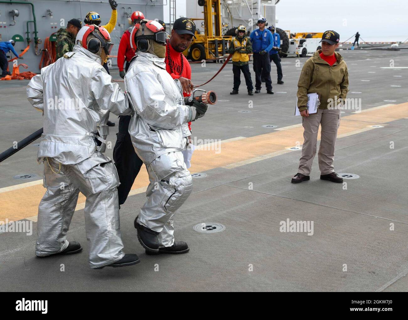210707-N-VJ326-1246 PACIFIC OCEAN (July 7, 2021) – Sailors participate in a flight deck ...