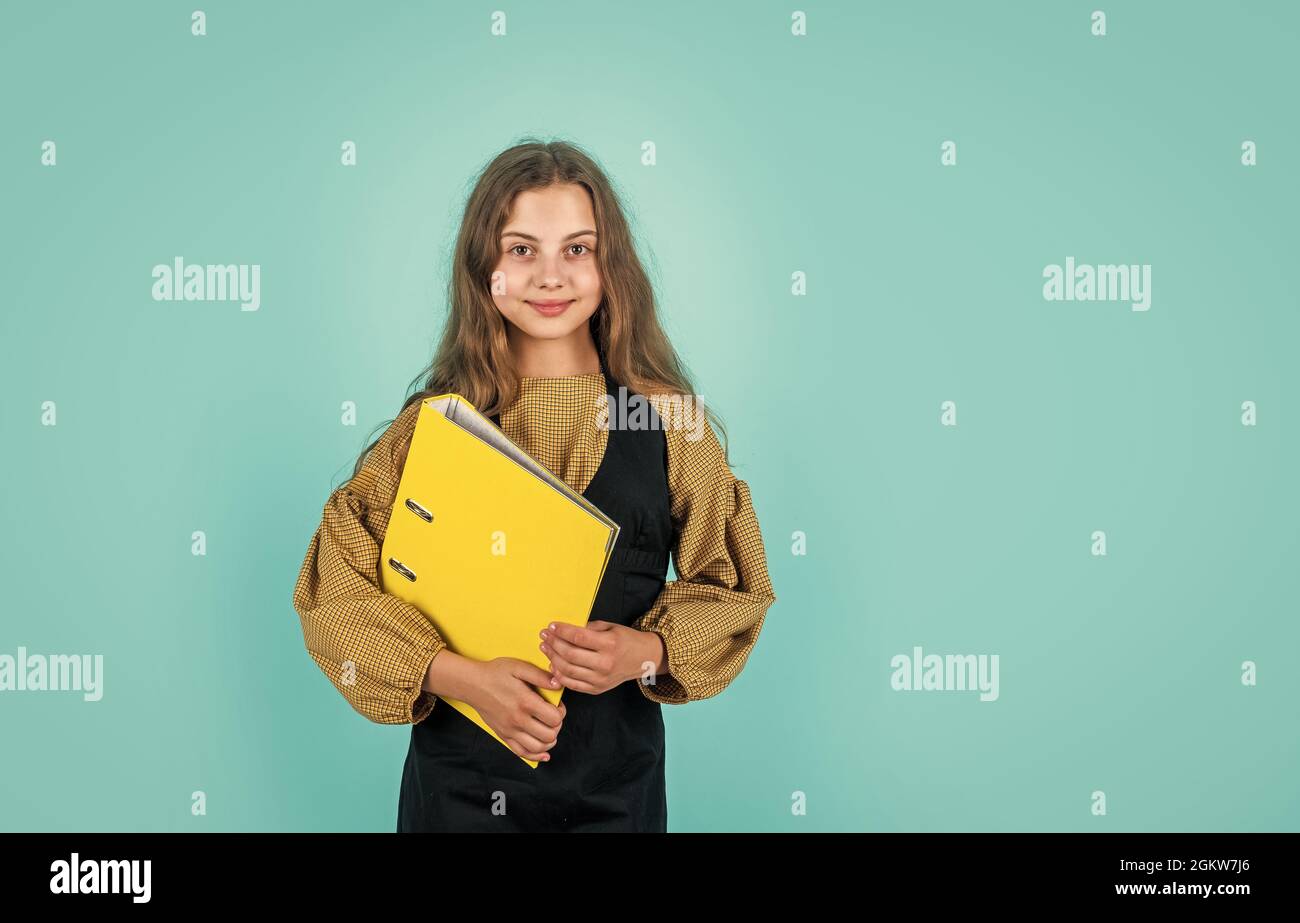 teen girl hold folder with documents. back to school. kid presenting ...