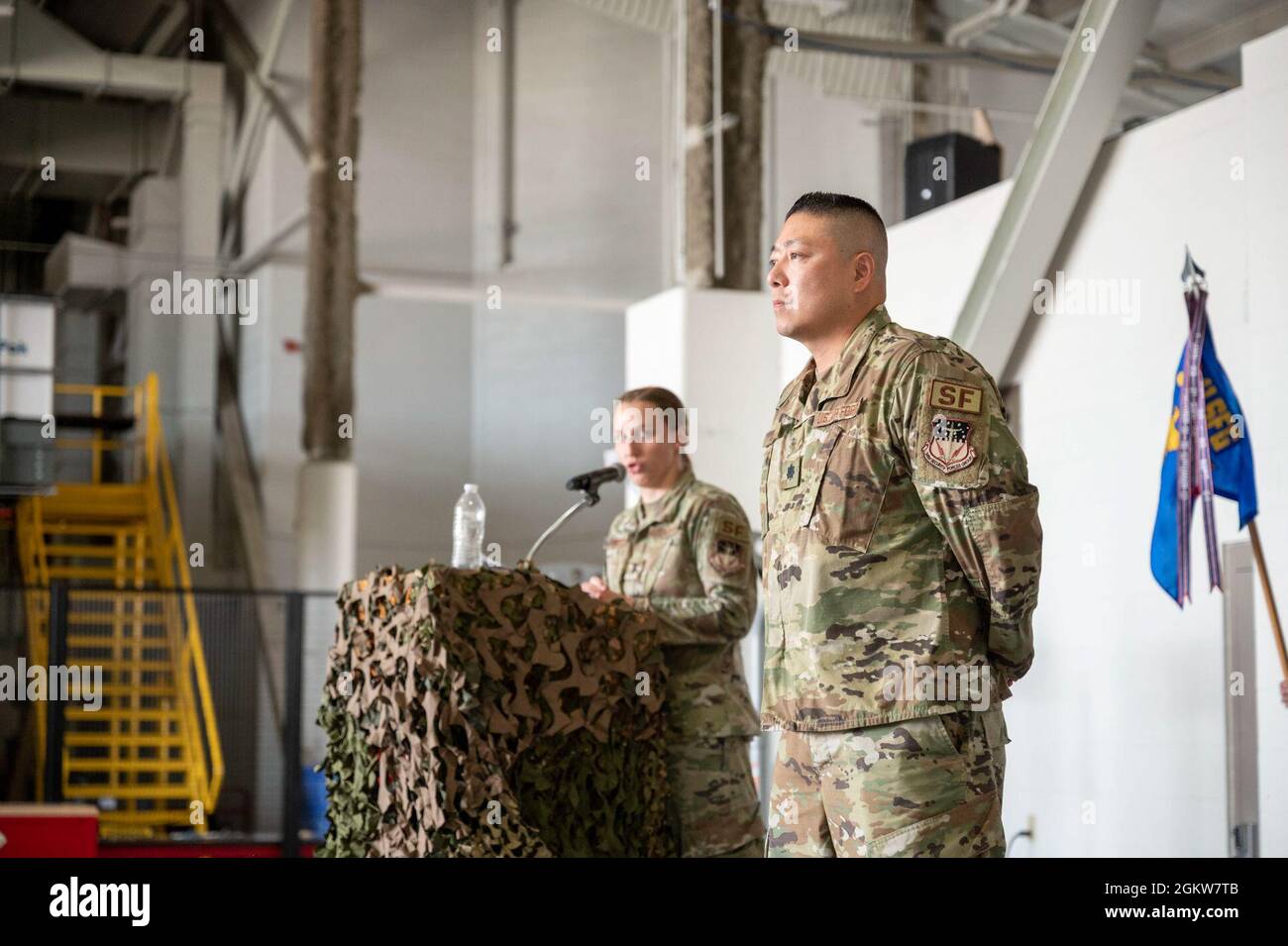 Lt. Col. Min Lee, 341st Missile Security Operations Squadron incoming commander, looks on as 1st ...