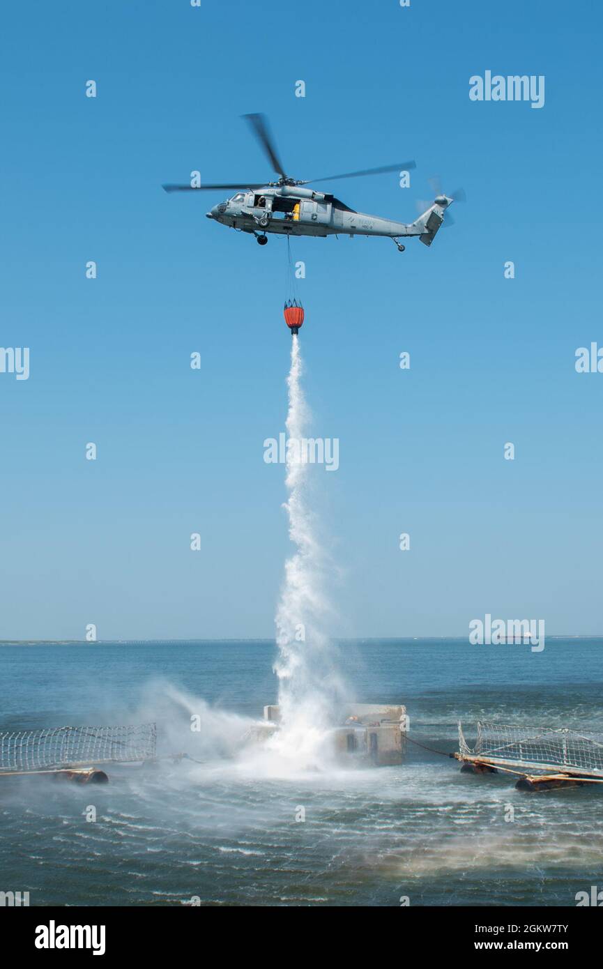 NORFOLK, Va. (July 7, 2021) An MH-60S Knighthawk, attached to ...