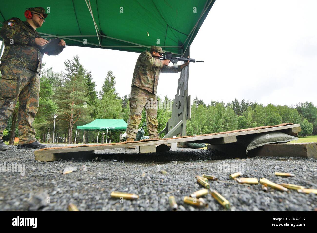 A U.S. Army Soldier with 18th Military Police Brigade fires a German ...