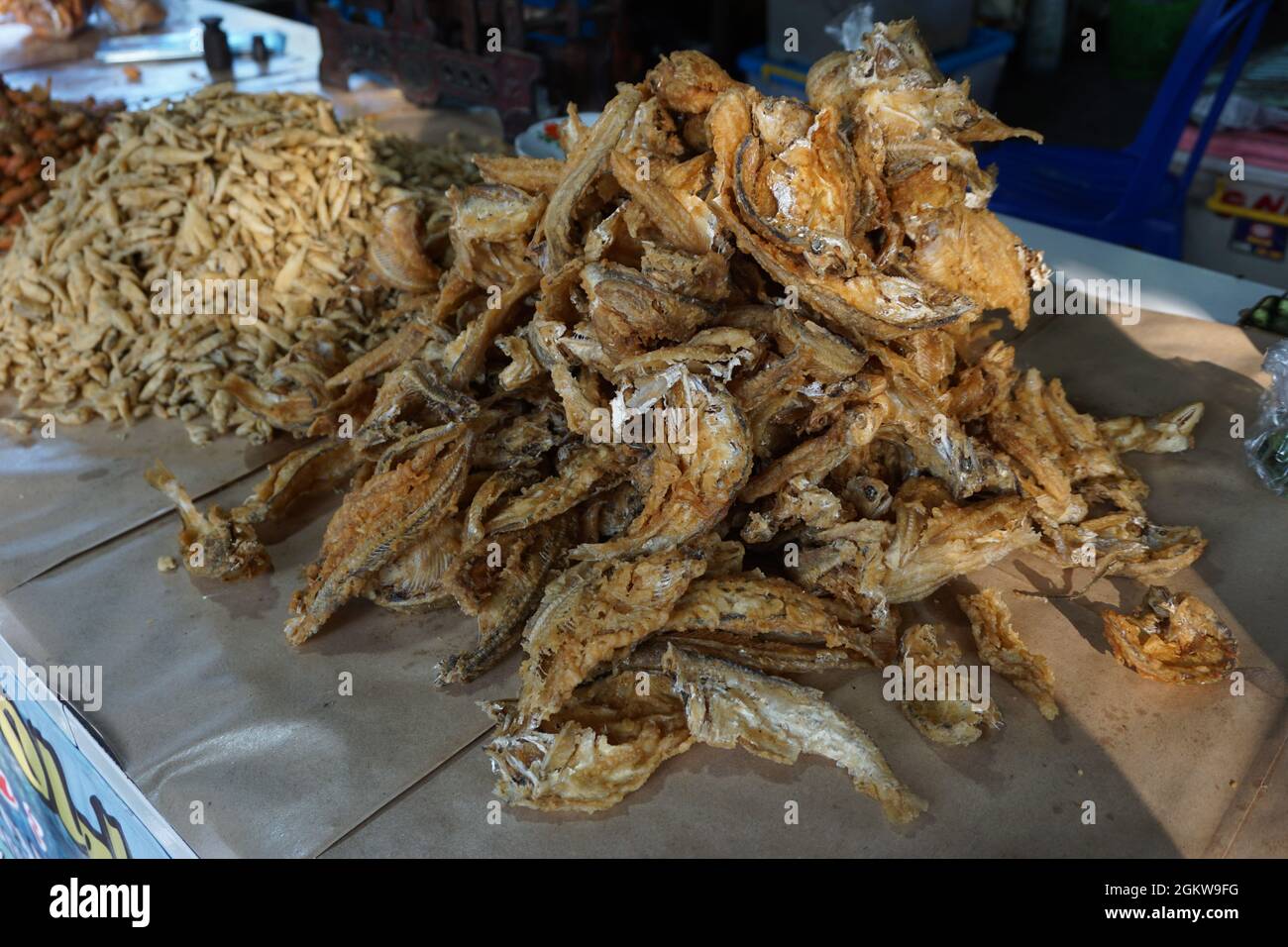Fried fish with a natural background. Indonesian fried fish covered ...