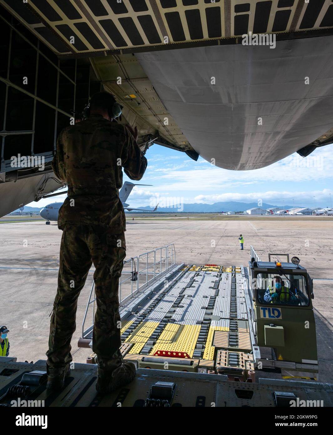 U.S. Air Force Staff Sgt. John Dittess, 9th Airlift Squadron loadmaster ...