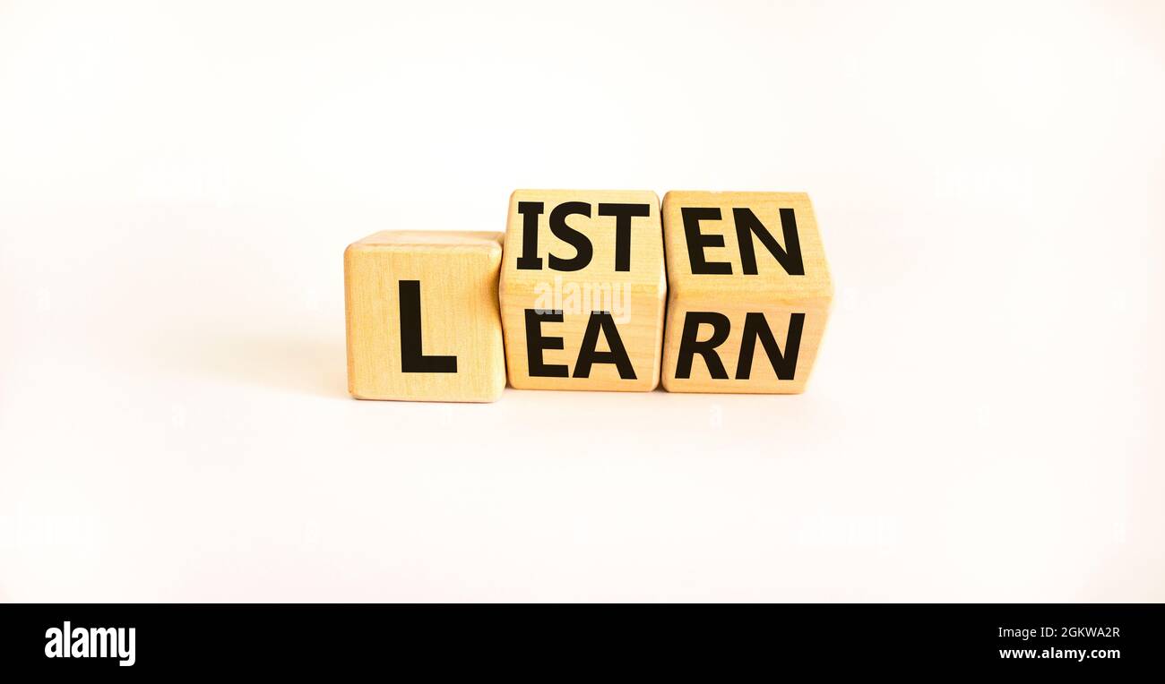 Listen and learn symbol. Turned wooden cubes and chaged a concept word ...