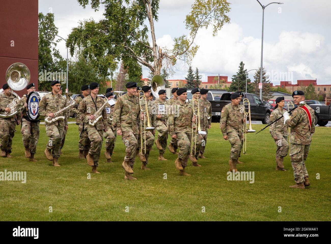 Soldiers with the 9th Army Band march onto Pershing field at Joint Base ...