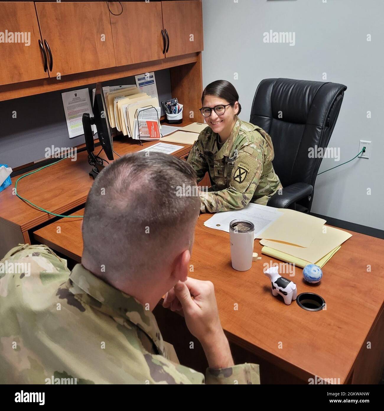 First Lt. Catherine Ricci, legal assistance attorney, advises a Soldier ...