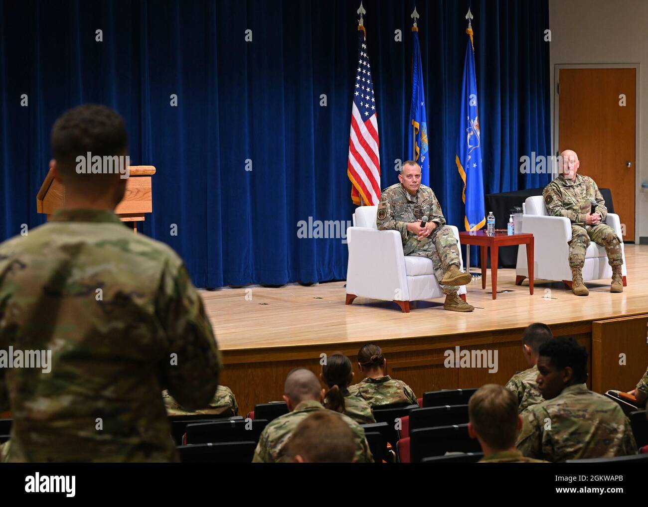 U.S. Air Force Chief Master Sgt. Erik Thompson (center), the command ...