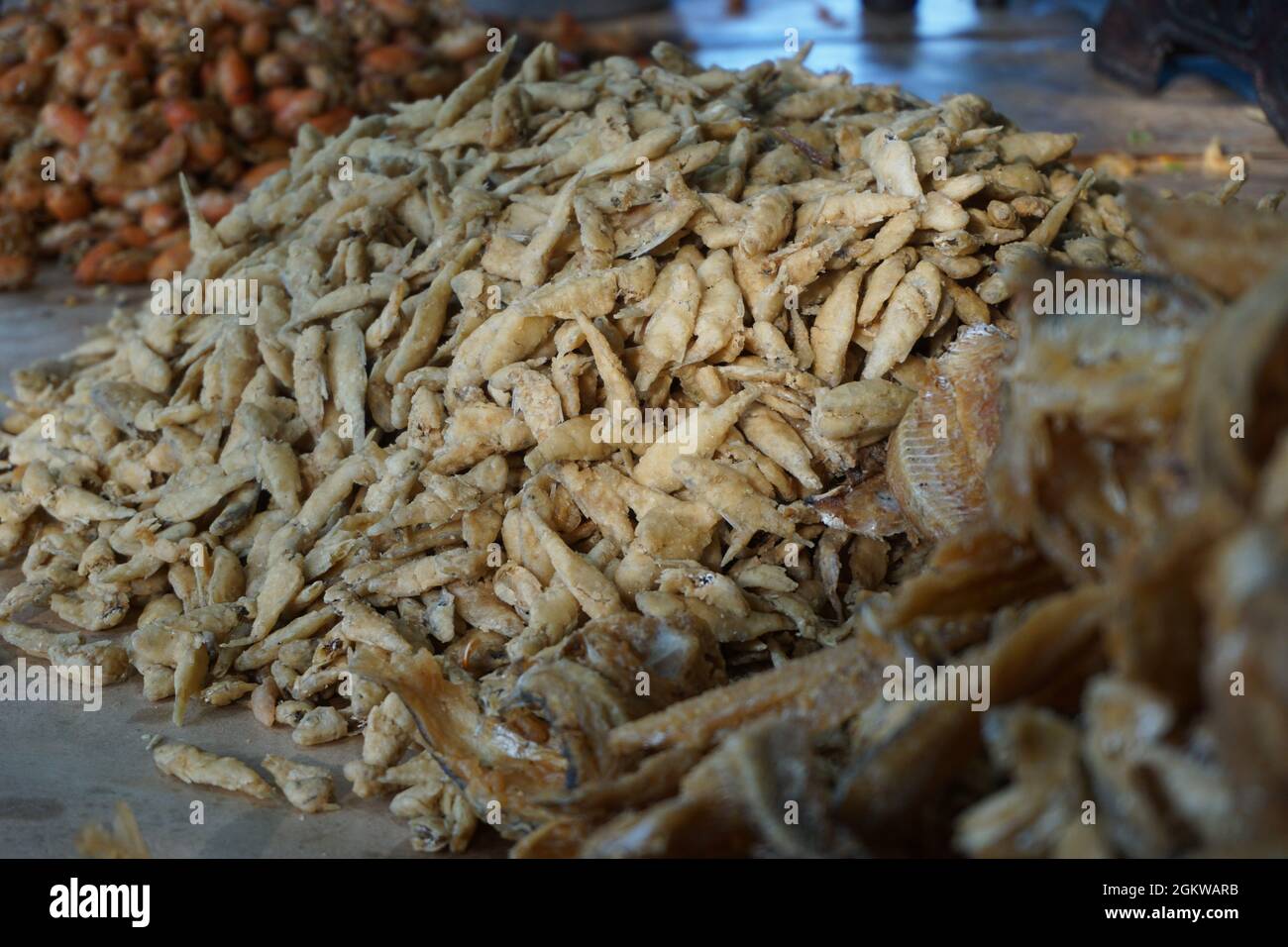 Fried fish with a natural background. Indonesian fried fish covered ...