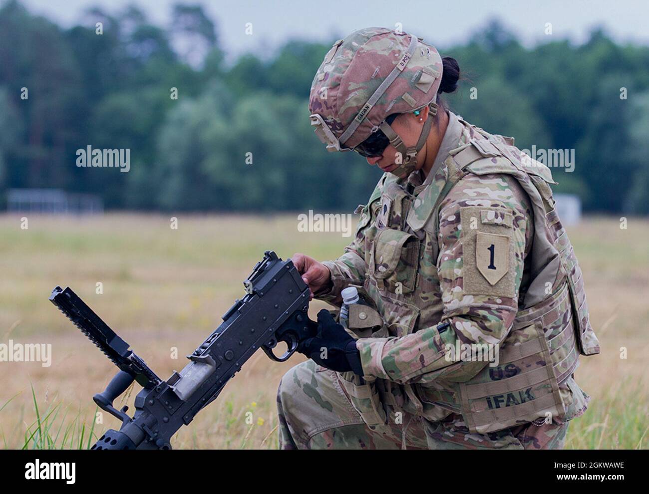 Spc. Aliyah Galvan, a weapons specialist assigned to Echo Company, 1-1 ...
