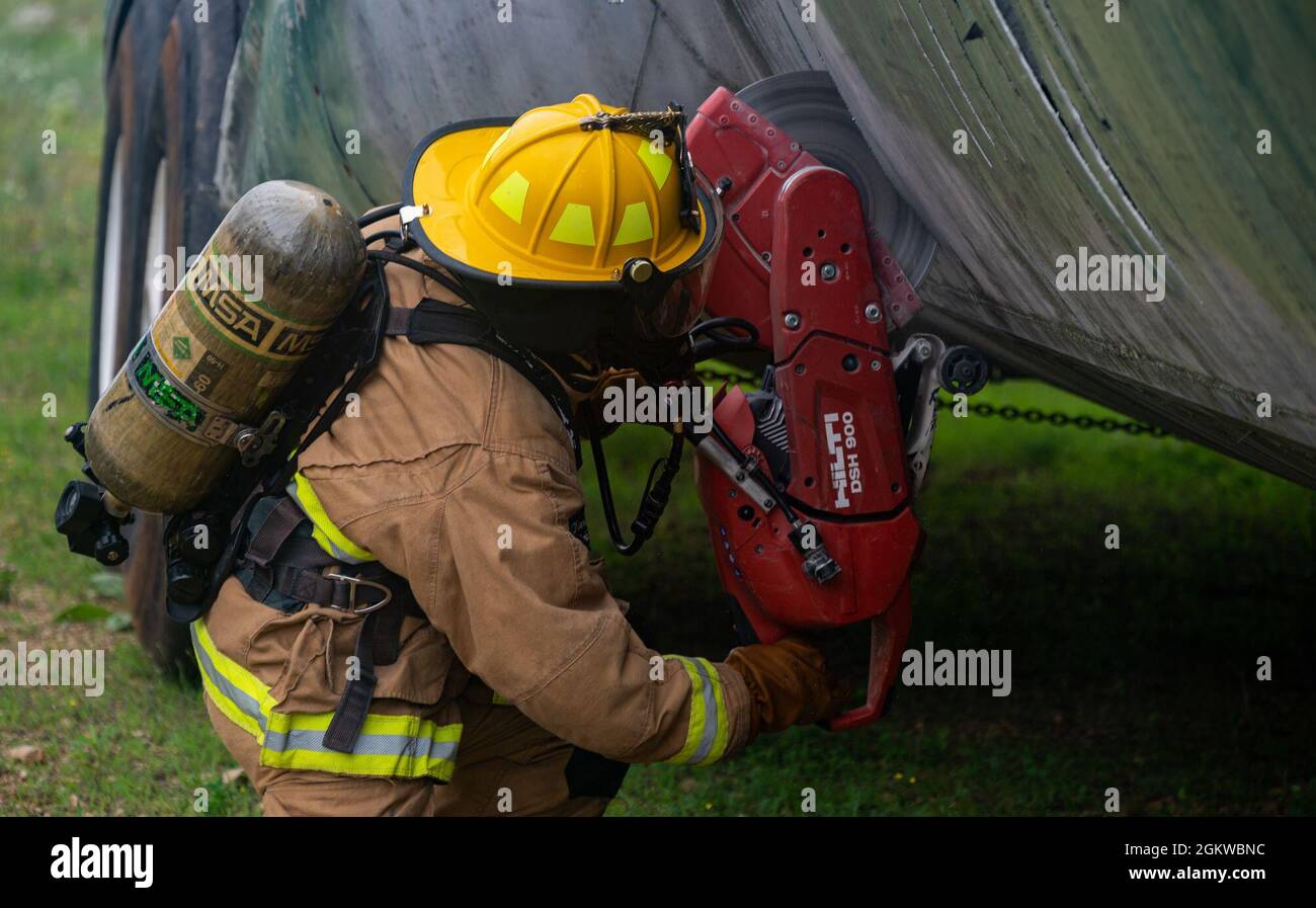 A 152nd Civil Engineer Squadron fire protection specialist uses a K12 ...