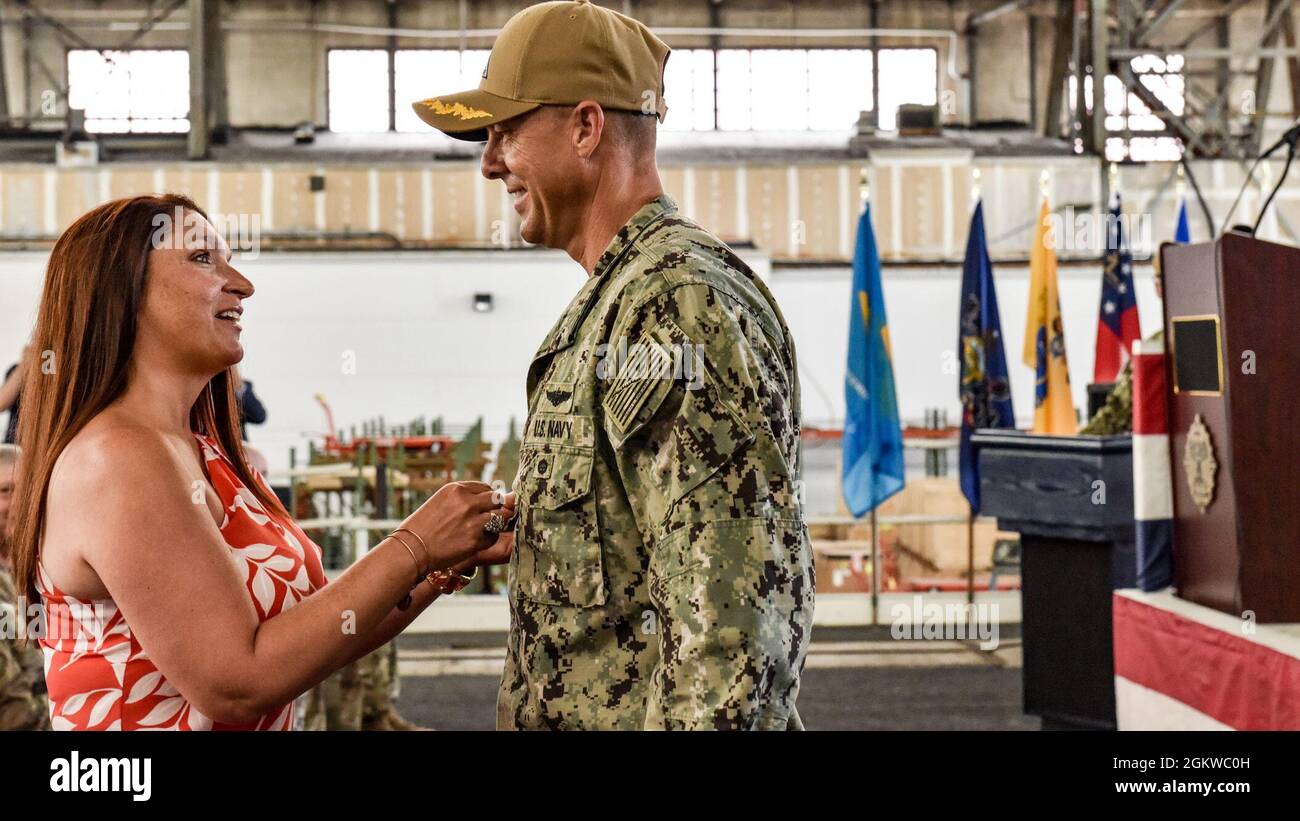 U.S. Navy Capt. Frank T. Ingargiola shares a moment with his wife as ...