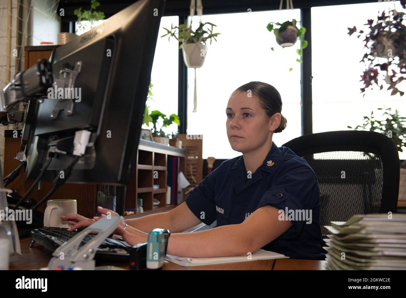Officer completing paperwork hi-res stock photography and images - Alamy