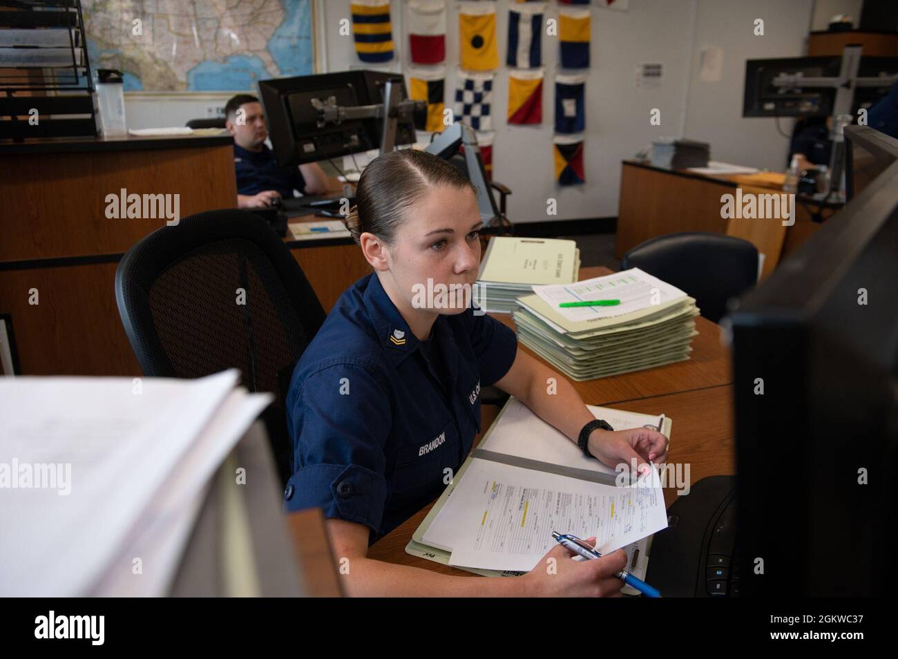 Officer completing paperwork hi-res stock photography and images - Alamy