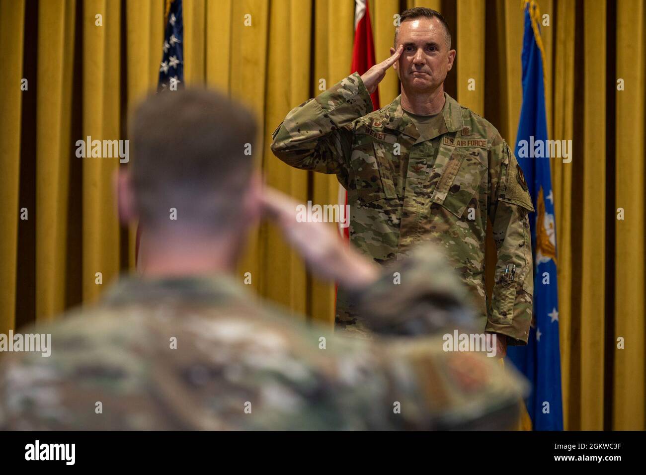 Col. Bradley Weast, incoming 39th Medical Group commander, renders his ...