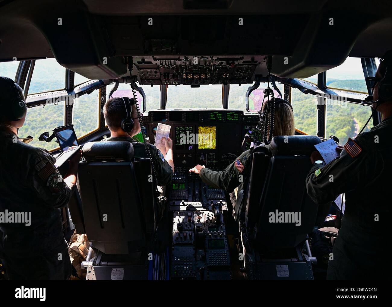 Col. Angela Ochoa, 19th Airlift Wing commander, right, pilots a C-130J ...