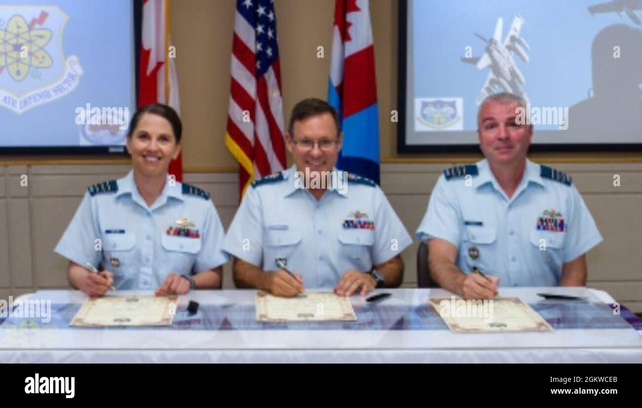 Royal Canadian Air Force Maj. Gen. Derek Joyce, center, Continental U.S ...
