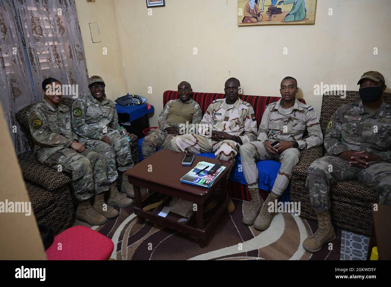 U.S. Air Force members assigned to Nigerien Air Base 201 pose for a ...