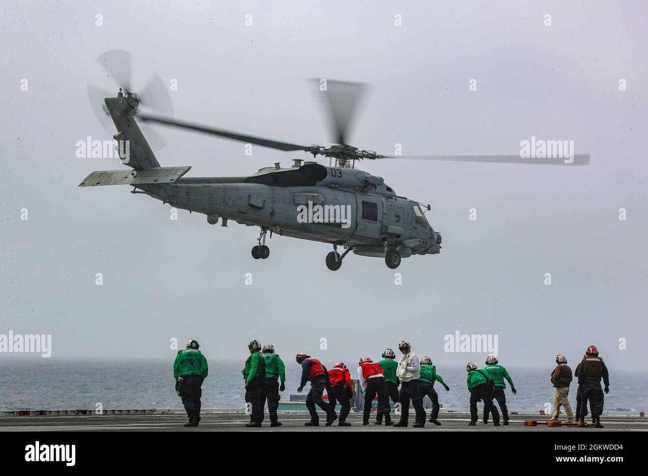 210708-N-NF912-1363 PACIFIC OCEAN (July 8, 2021) An MH-60R Seahawk ...