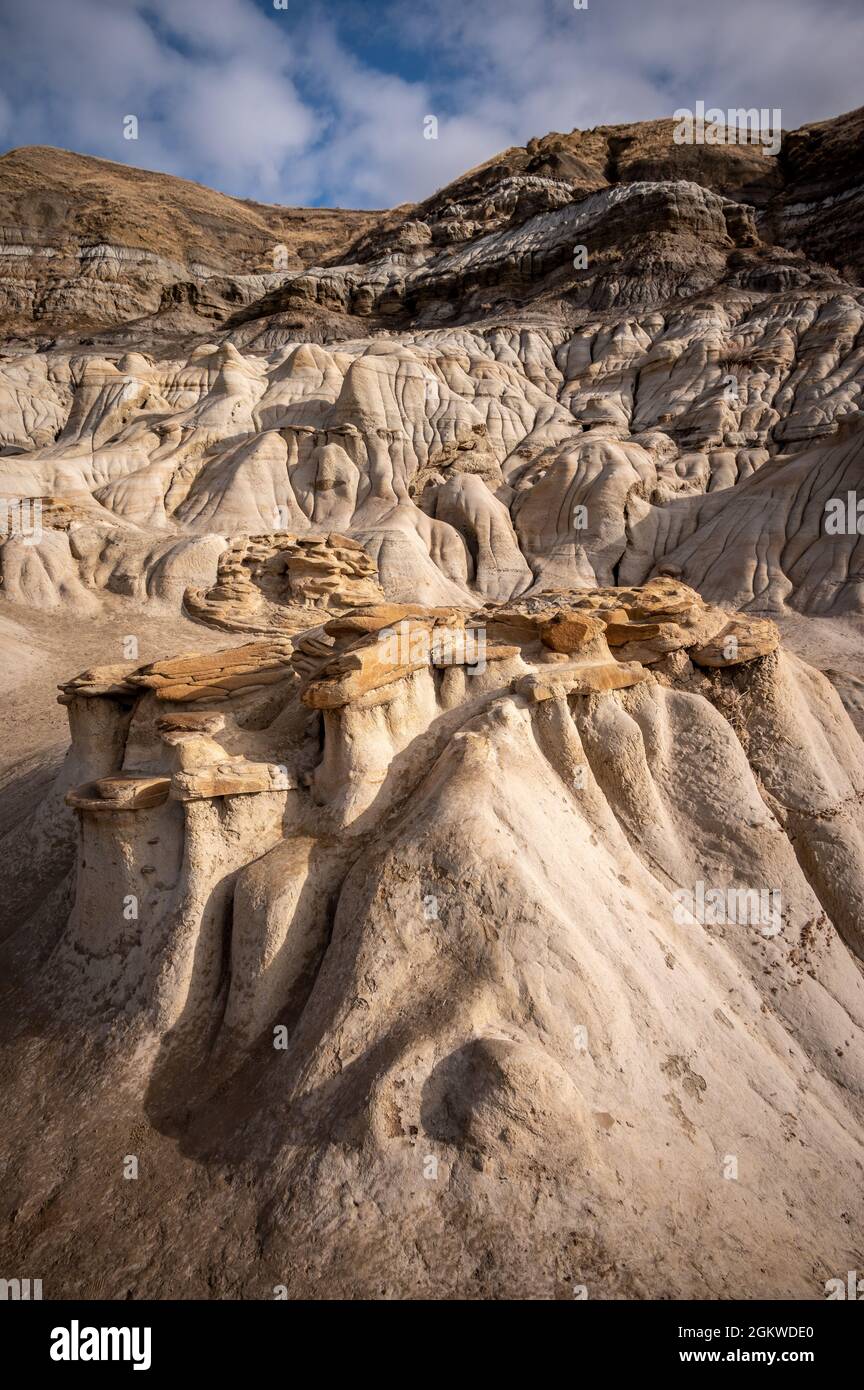 Closeup vertical shot of a mountain has made of the natural geological ...