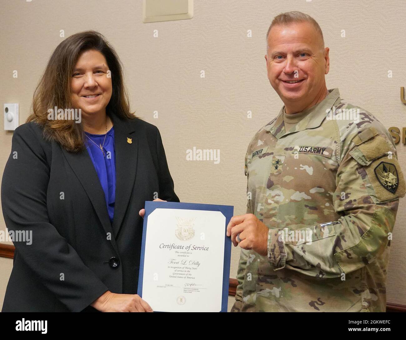 Mrs. Terri Dilly accompanied by Chief of Staff Maj. Gen. Vincent B ...