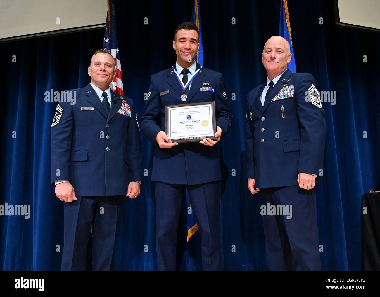 U.S. Air Force Senior Airman Justyn Freeman receives the Distinguished ...