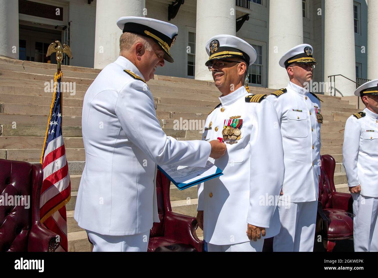 PORTSMOUTH, Va. (July 9, 2021) – Capt. Robert Hawkins, center ...