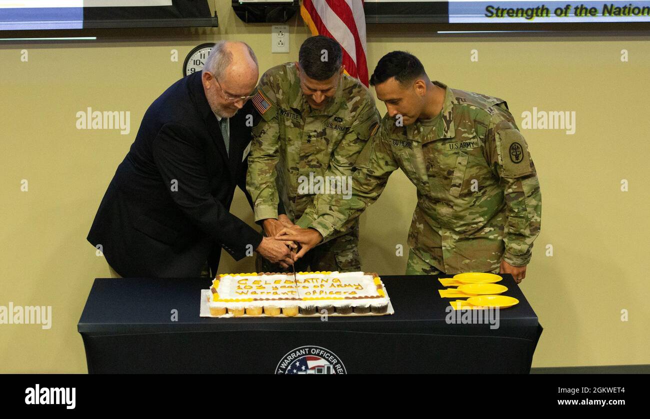 From left, retired Chief Warrant Officer Raymond Bell, U.S. Army North ...