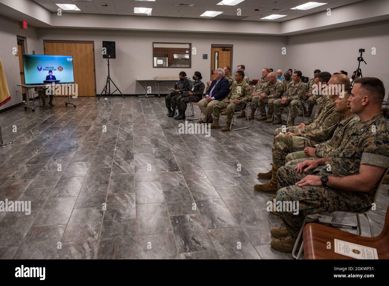 Ms. Brenda Lee McCullough, left, director of U.S. Army Installation ...