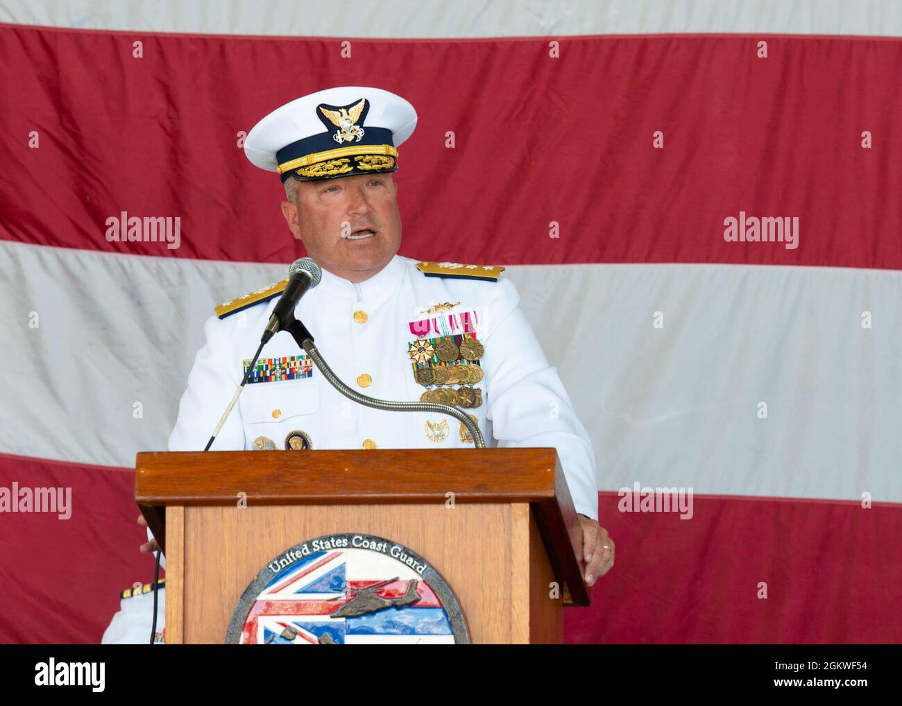Rear Adm. Matthew Sibley, commander, Coast Guard 14th District, speaks ...