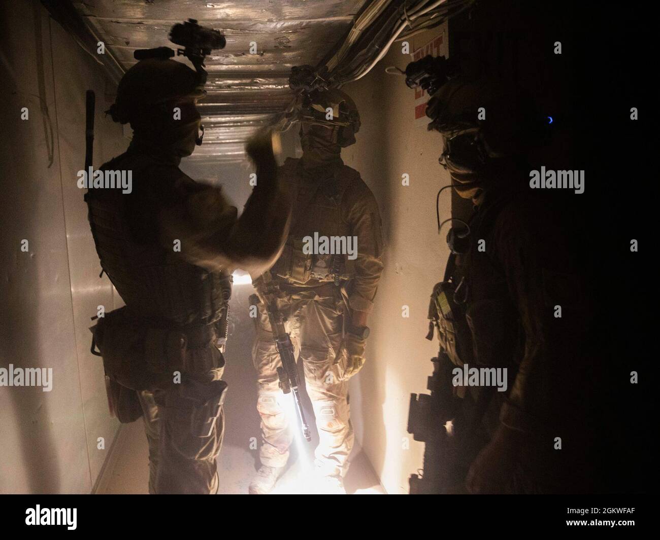 Norwegian Soldiers from Task Force Viking, move through a building ...