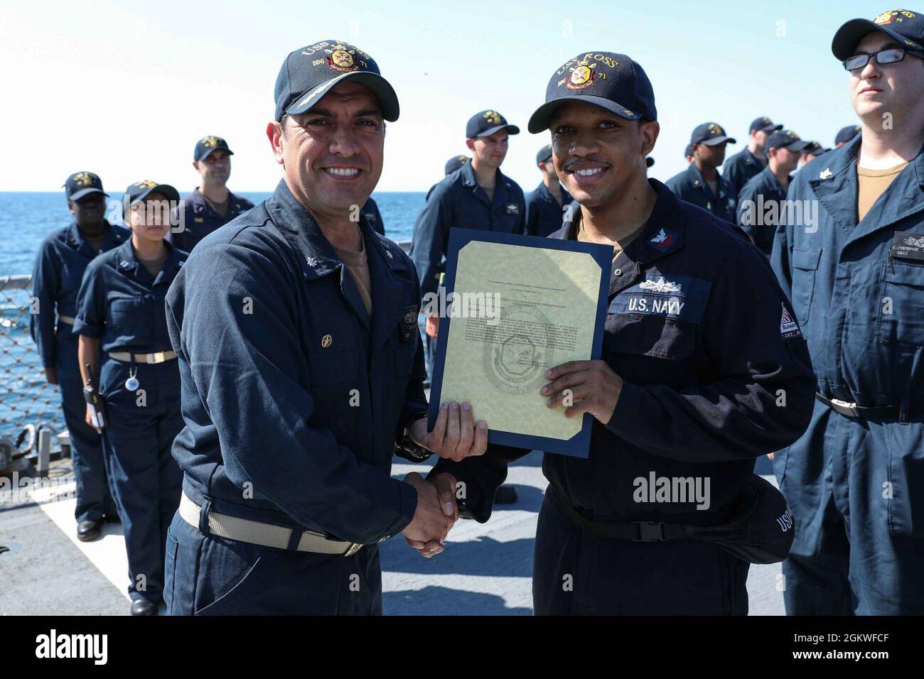 BLACK SEA (July 9, 2021) Commanding Officer Cmdr. John D. John, left ...