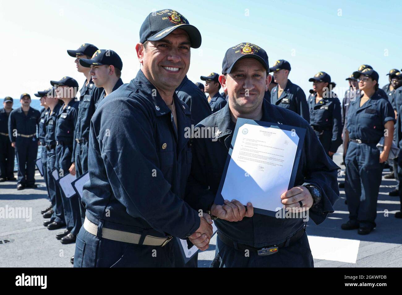BLACK SEA (July 9, 2021) Commanding Officer Cmdr. John D. John, left ...