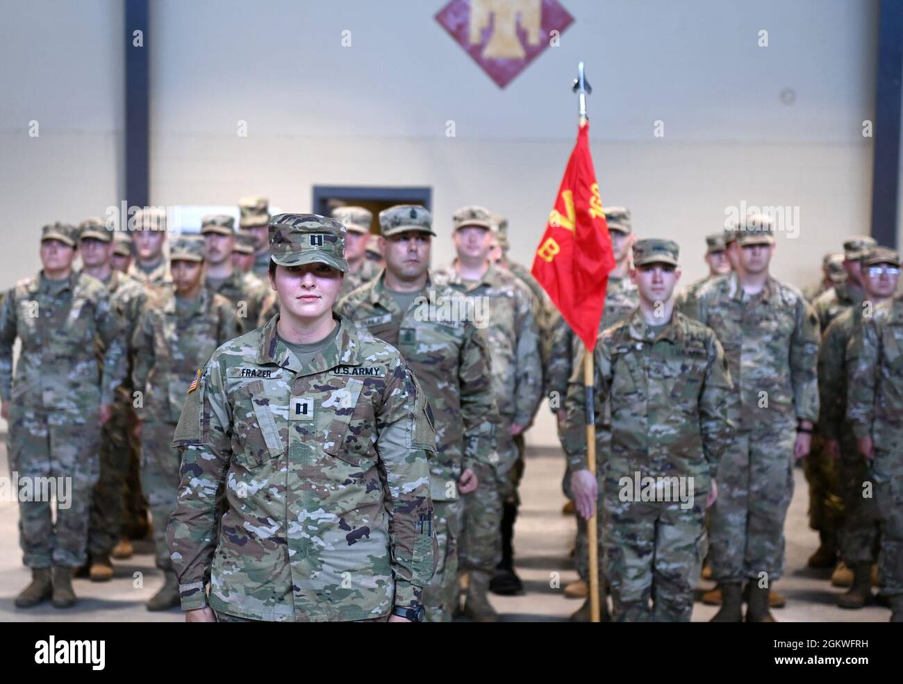 Capt. Marissa Frazer stands at attention command during a change of ...