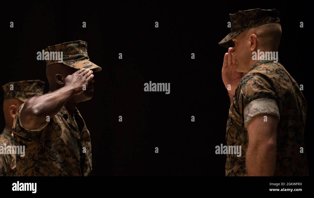 U.S. Marine Corps Sgt. Maj. Charles Tyler, left, the outgoing sergeant ...