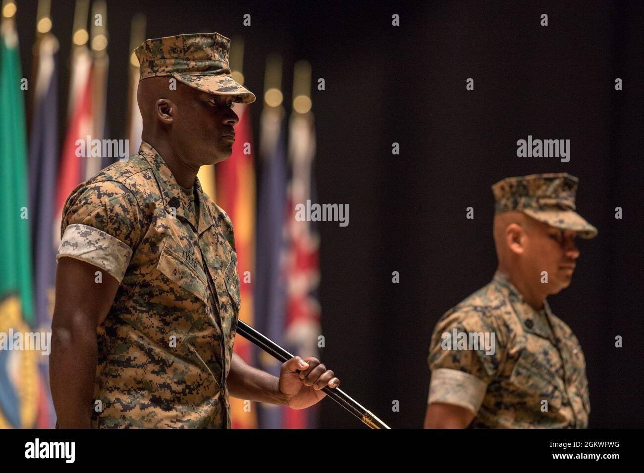 U.S. Marine Corps Sgt. Maj. Charles Tyler, left, the outgoing sergeant ...