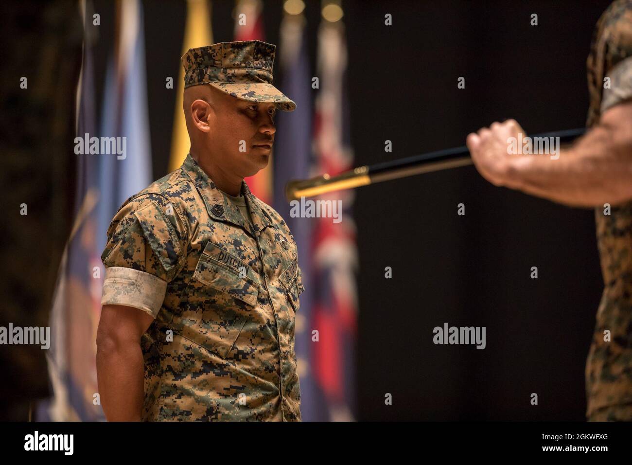 U.S. Marine Corps Sgt. Maj. Michael Dutchin, the oncoming sergeant ...