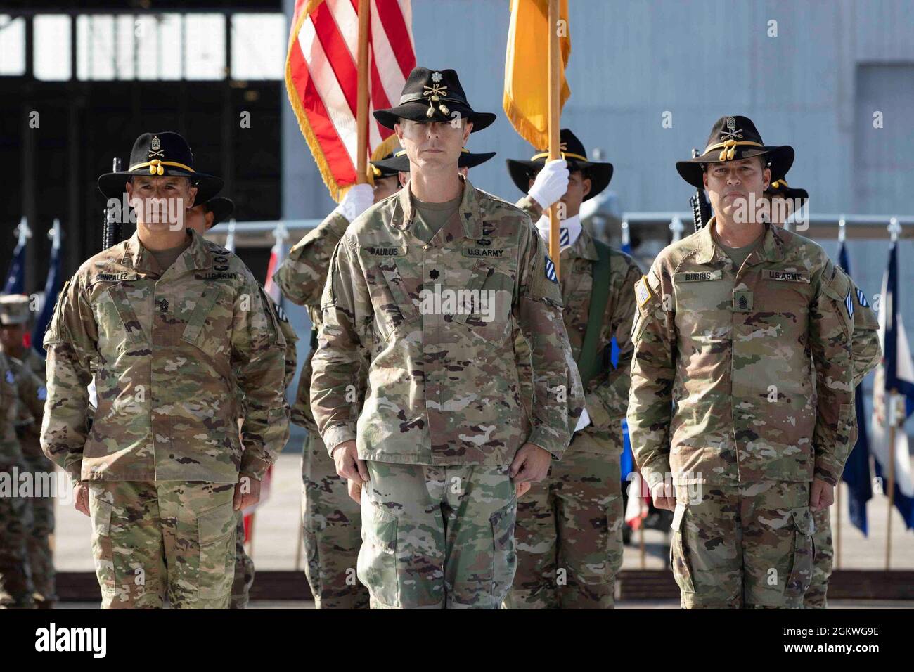 Command Sgt. Maj. Edgard Gonzales (left), the incoming command sergeant ...