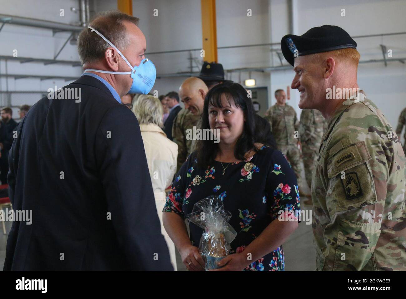 U.S. Army Col. John Broam, right, outgoing commander greets Thomas ...