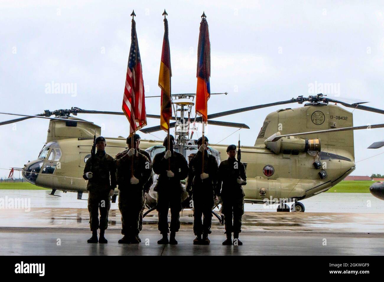A color guard from 12th Combat Aviation Brigade stands in formation for ...