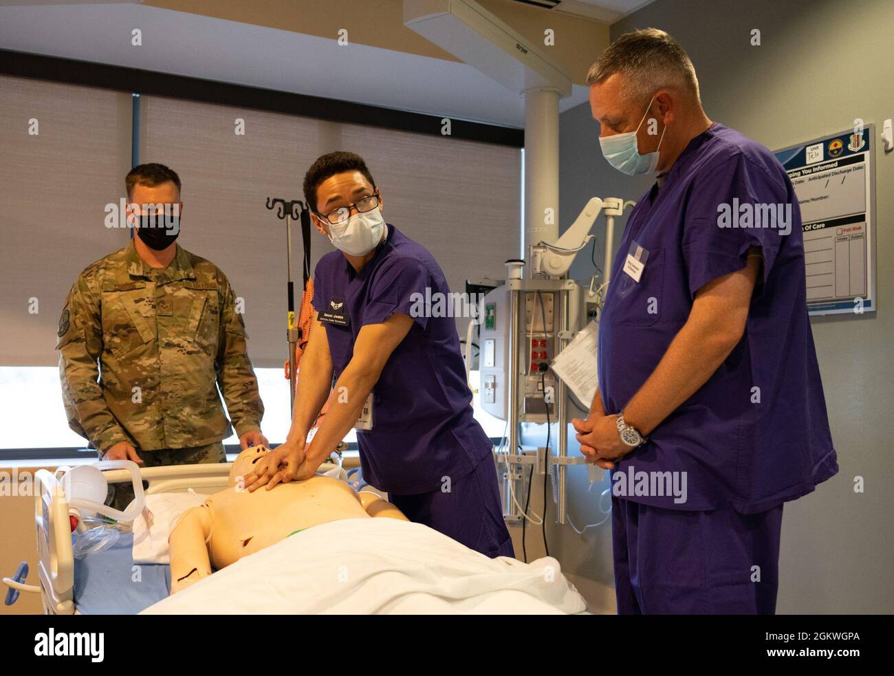 Airman 1st Class Isaac James, center, 60th Inpatient Therapeutic ...