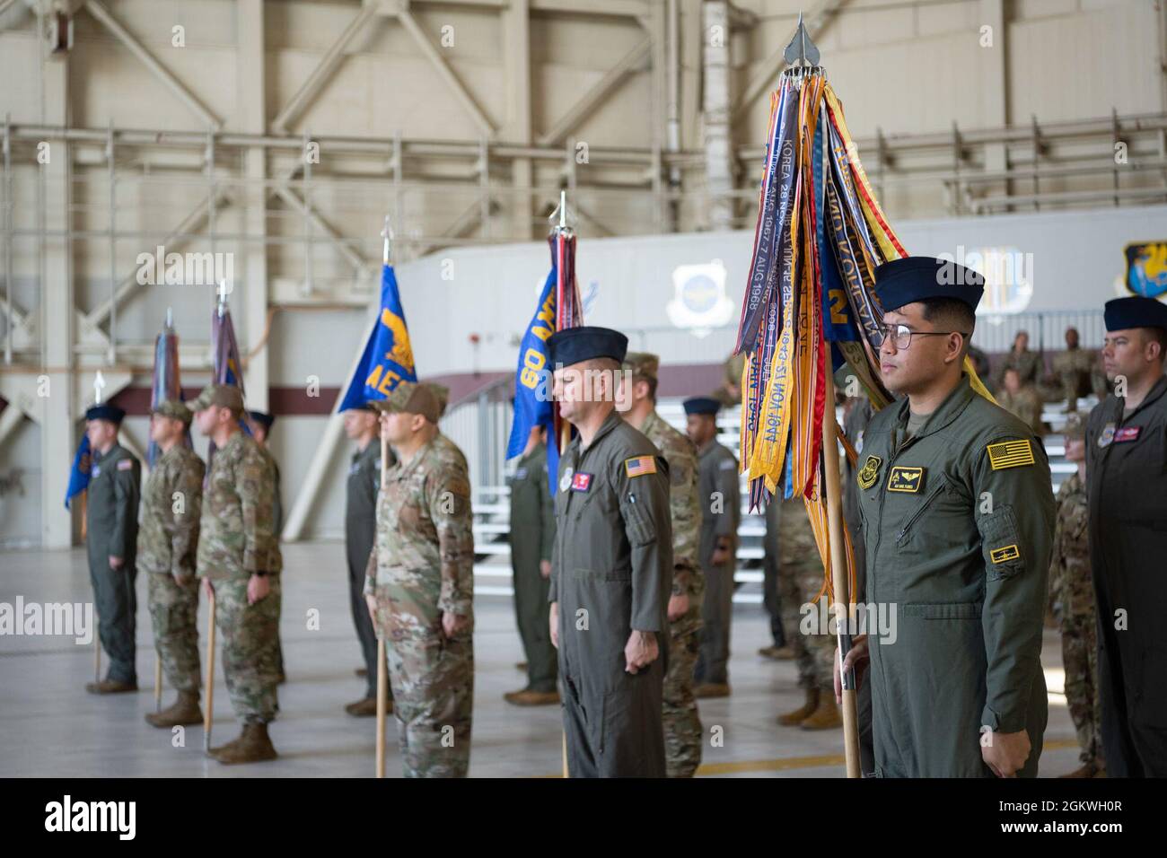 Airmen assigned to Travis Air Force Base, California, stand at ...