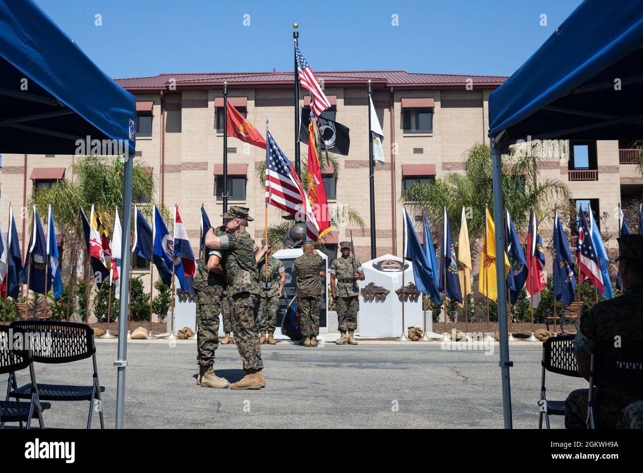 U.S. Marine Corps Lt. Col. Christopher Winn (left) the incoming ...