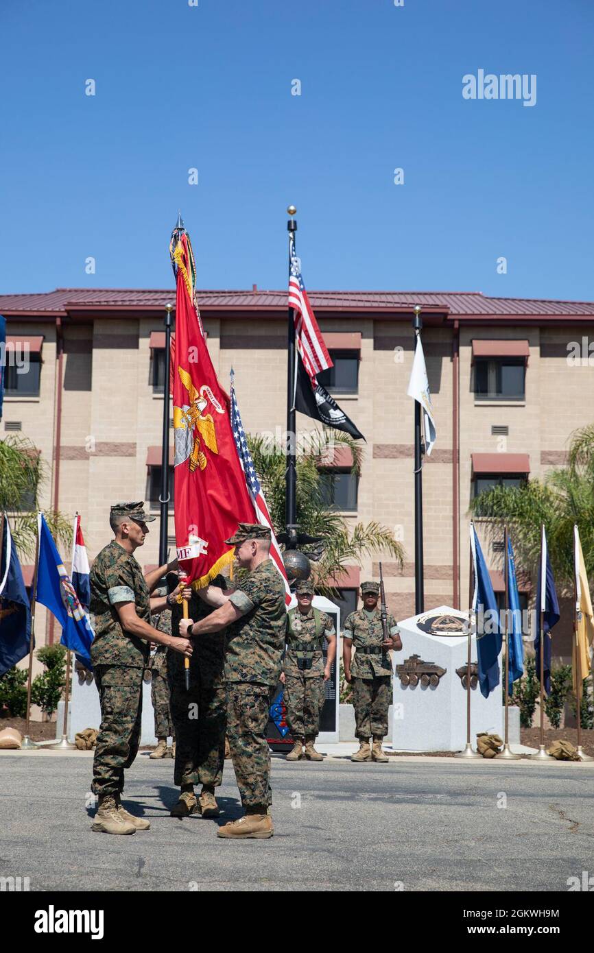 U.S. Marine Corps Lt. Col. Christopher Winn (left) the incoming ...