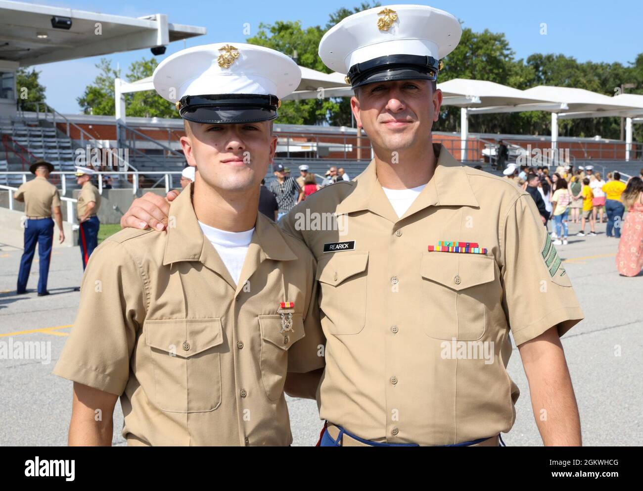 Sgt. Matthew Rearick and Pvt. Marc Rearick pose for a photo on Marine ...