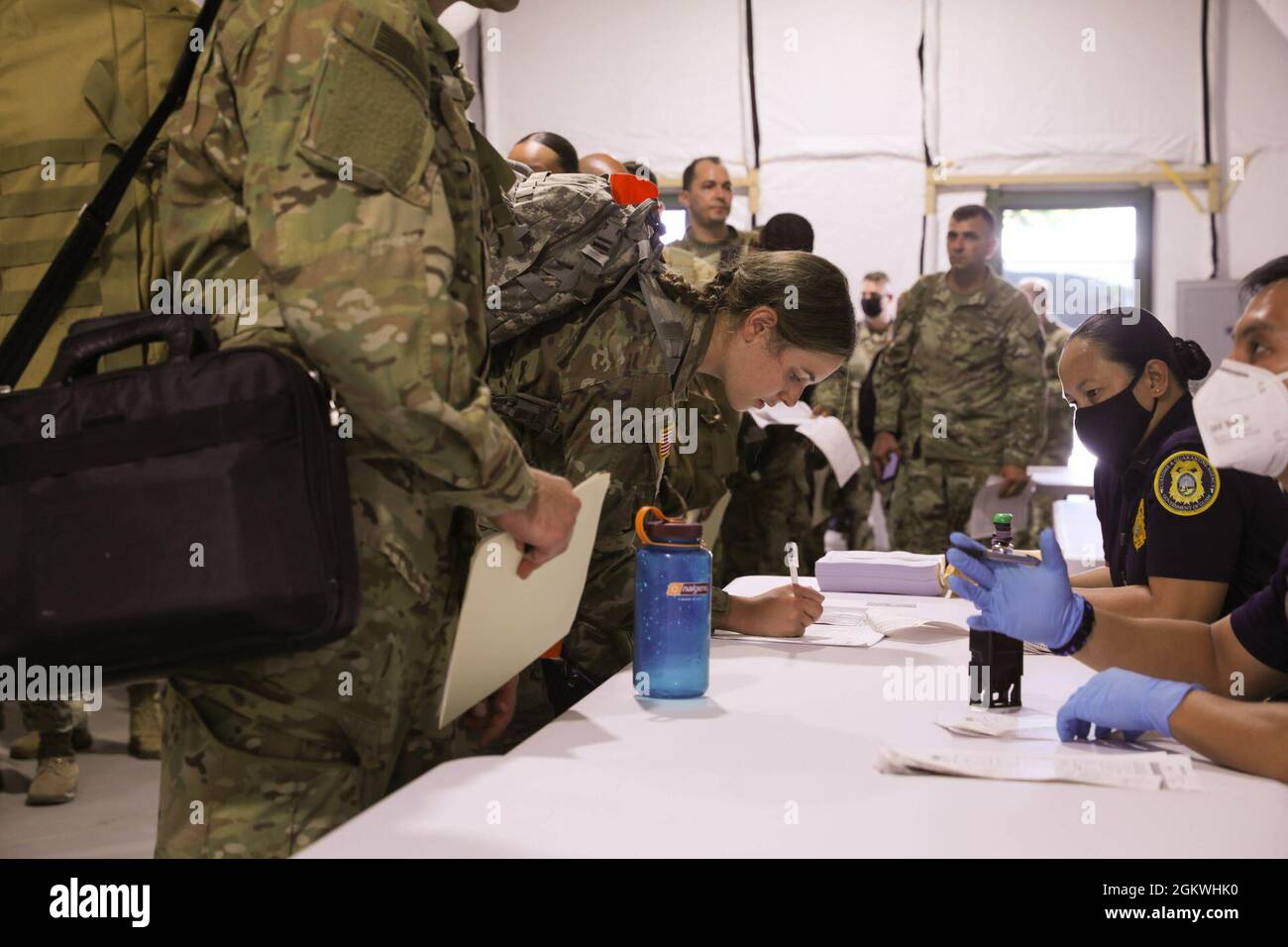 America’s First Corps Soldiers go through customs during the Forager 21 ...