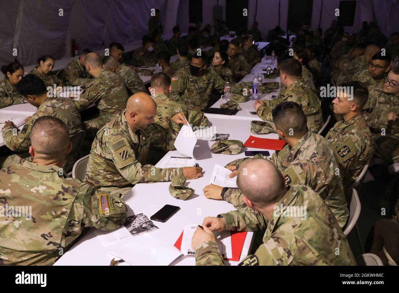 America’s First Corps Soldiers prepare for a briefing during the ...