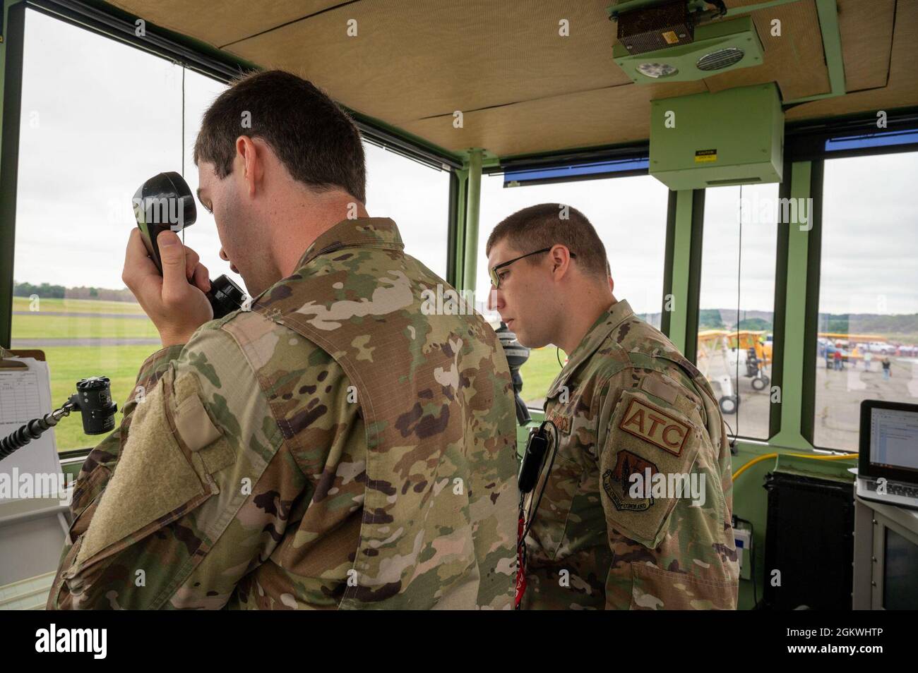 Staff Sergeant Derek Robertson and Technical Sergeant Vincent Mione ...