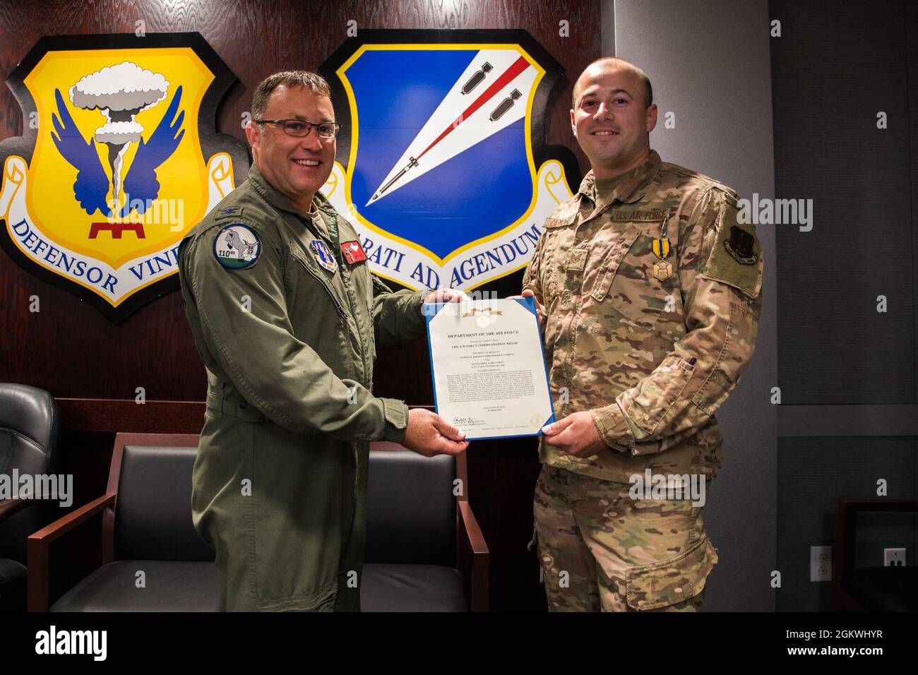 Missouri Air National Guard Tech. Sgt. Christopher Capkovic, right, a ...