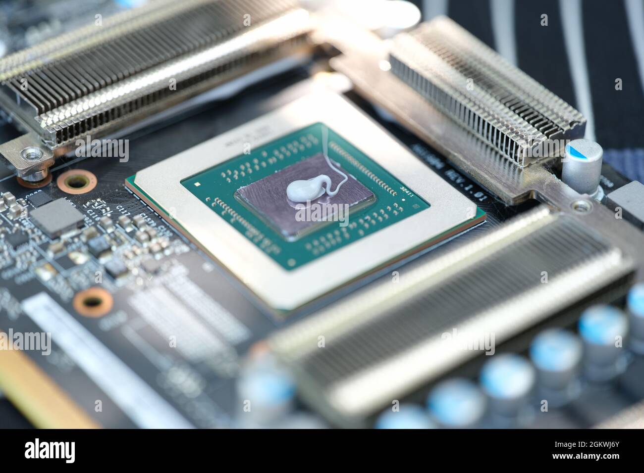 Thermal paste lying on processor from video card closeup Stock Photo ...